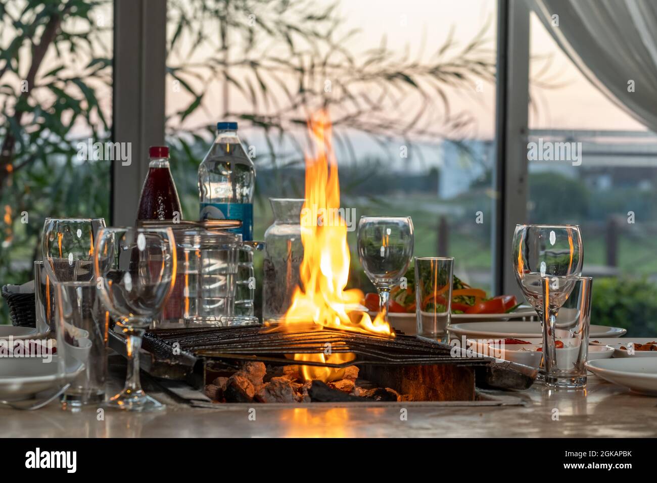 Different types of meat grilled on Barbecue on the table, Served with ...