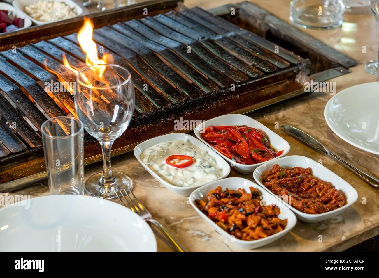 Different types of meat grilled on Barbecue on the table, Served with ...