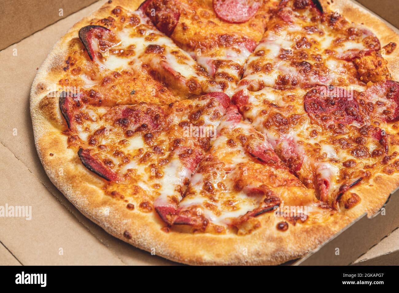 Top view of hot pizza in recycled pizza box Stock Photo - Alamy