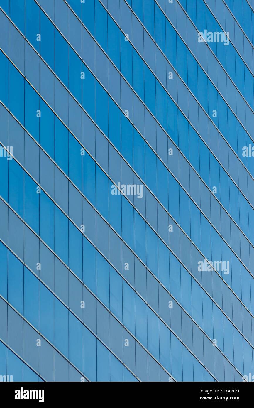 Modern office building with glass reflection background Stock Photo - Alamy