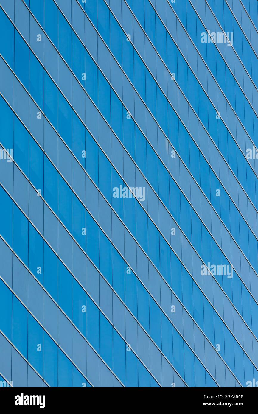 Modern office building with glass reflection background Stock Photo - Alamy