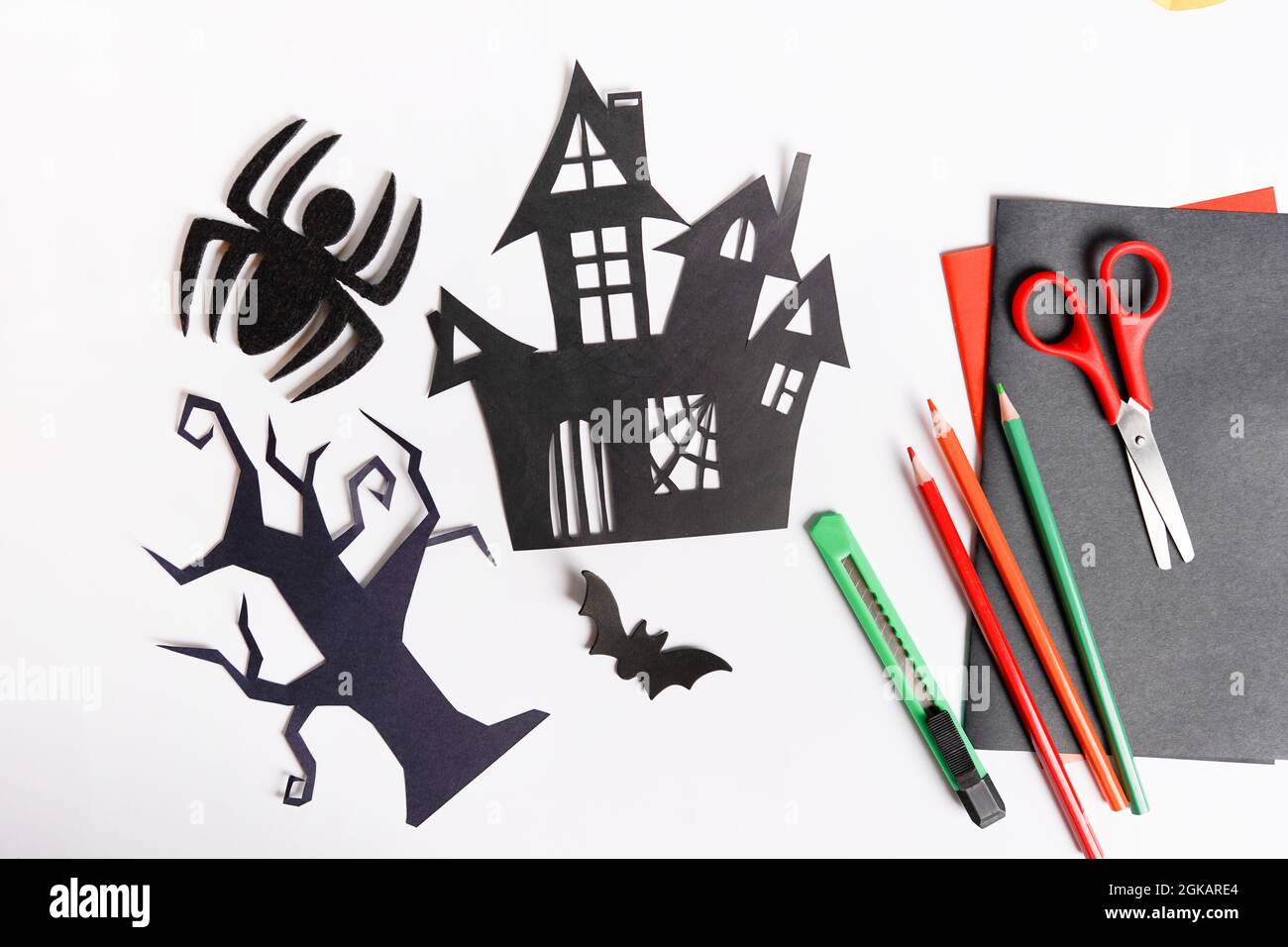 Halloween preparation. Halloween decoration made of black craft paper ...