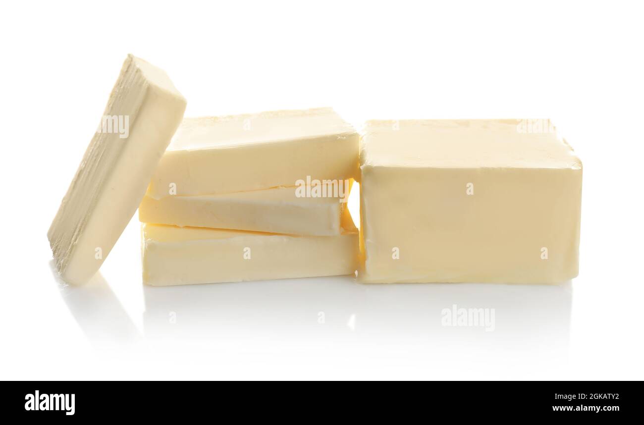 Pieces of butter on white background Stock Photo - Alamy