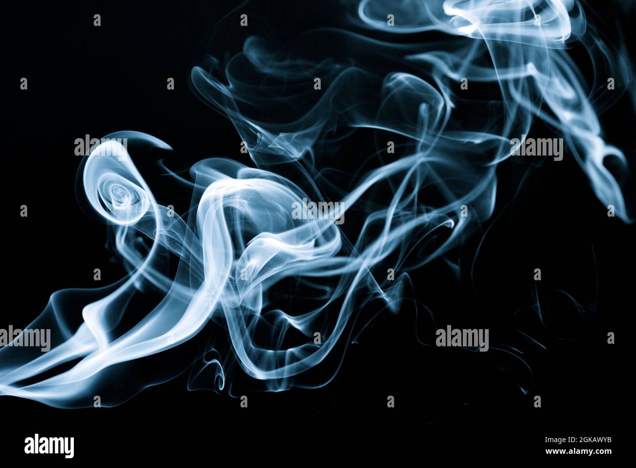 Abstraction created with smoke on a black background Stock Photo - Alamy
