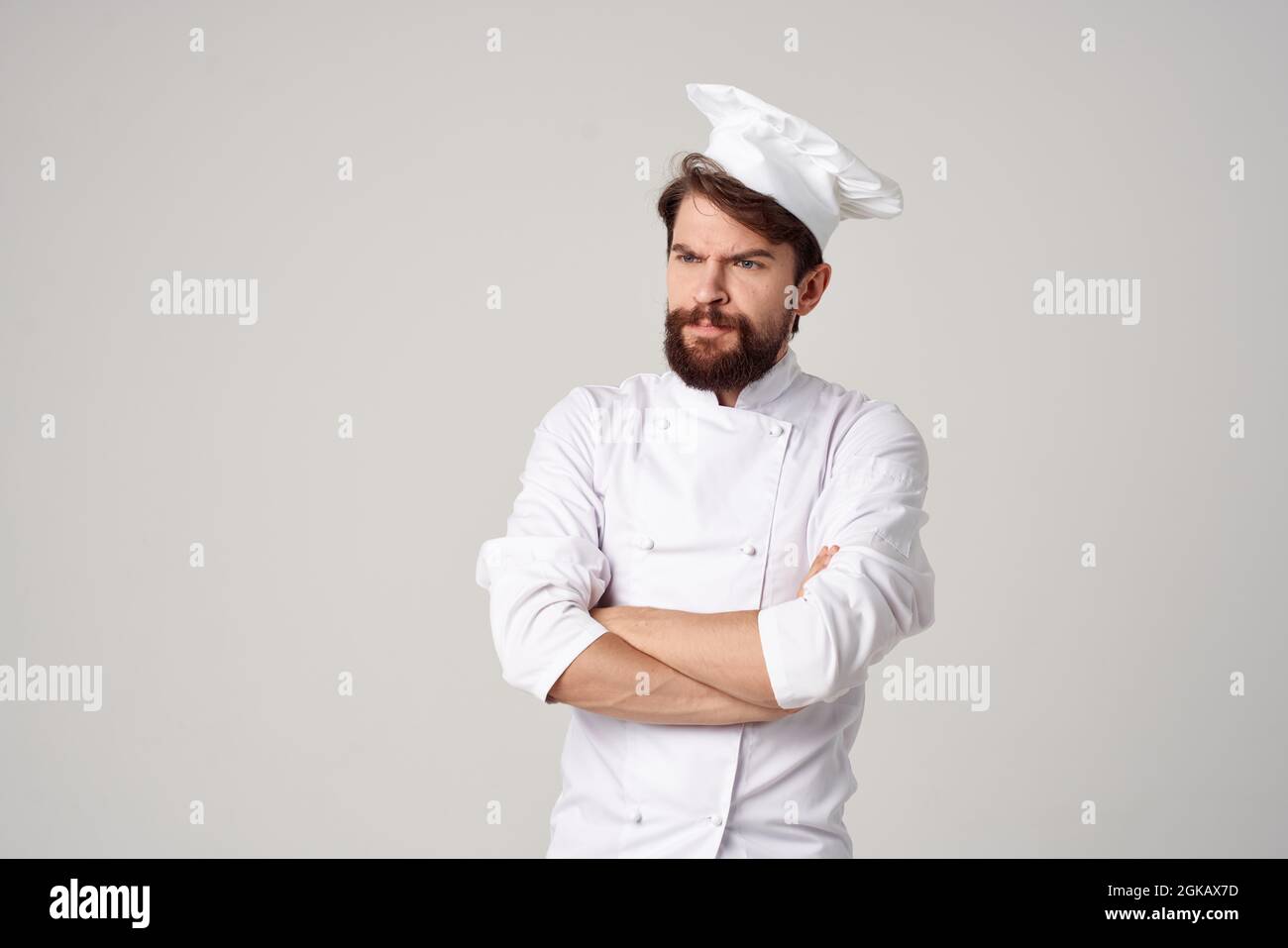 bearded man Chef uniform Cooking emotions posing studio Stock Photo - Alamy