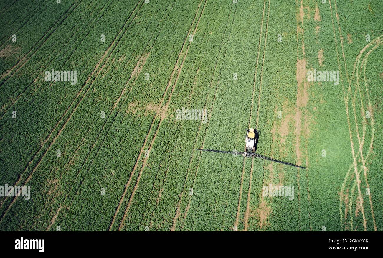Fertilizer in farm field with tractor aerial perspective view Stock ...