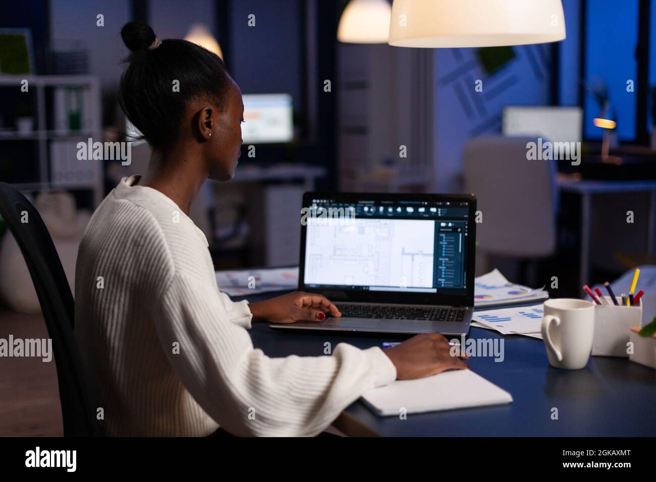 Overworked architect analyzing blueprint engineering project plan ...