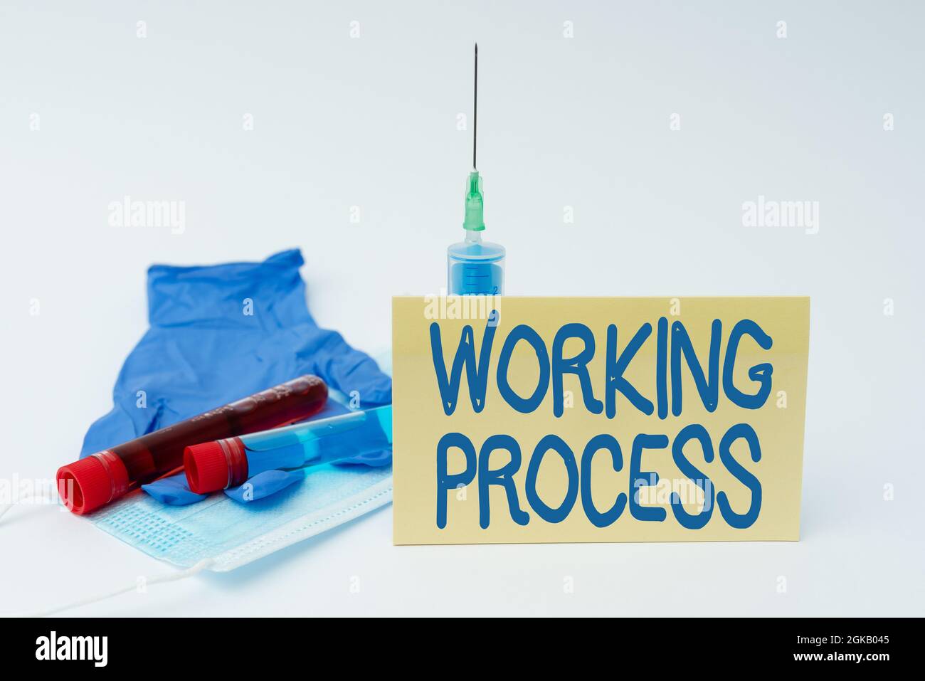 Hand writing sign Working Process. Business idea company s is partially ...