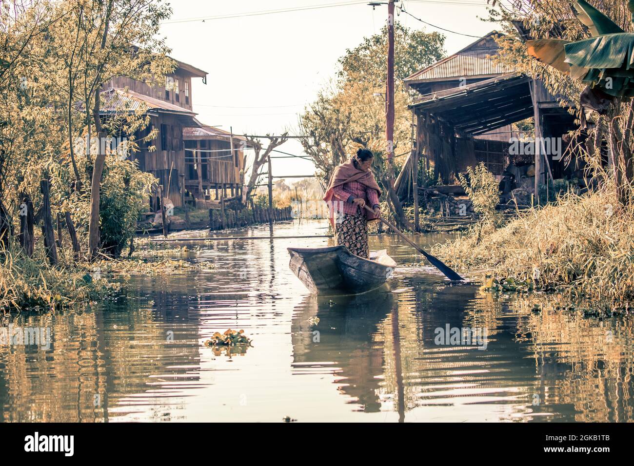 Old Lady rowing boat on Inle Lake Myanmar Stock Photo - Alamy
