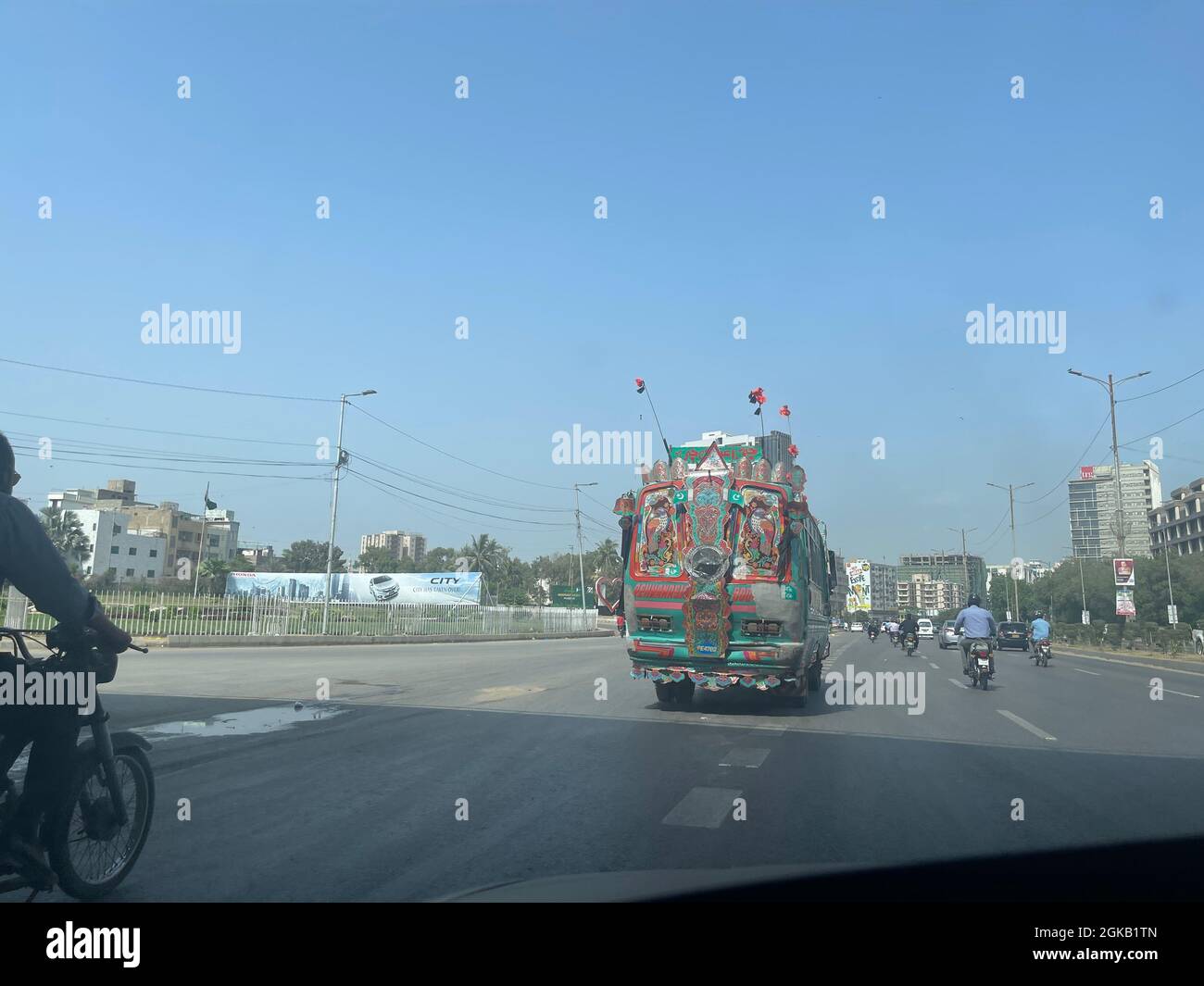 Main Landhi Korangi Road. Karachi city traffic at working hours ...