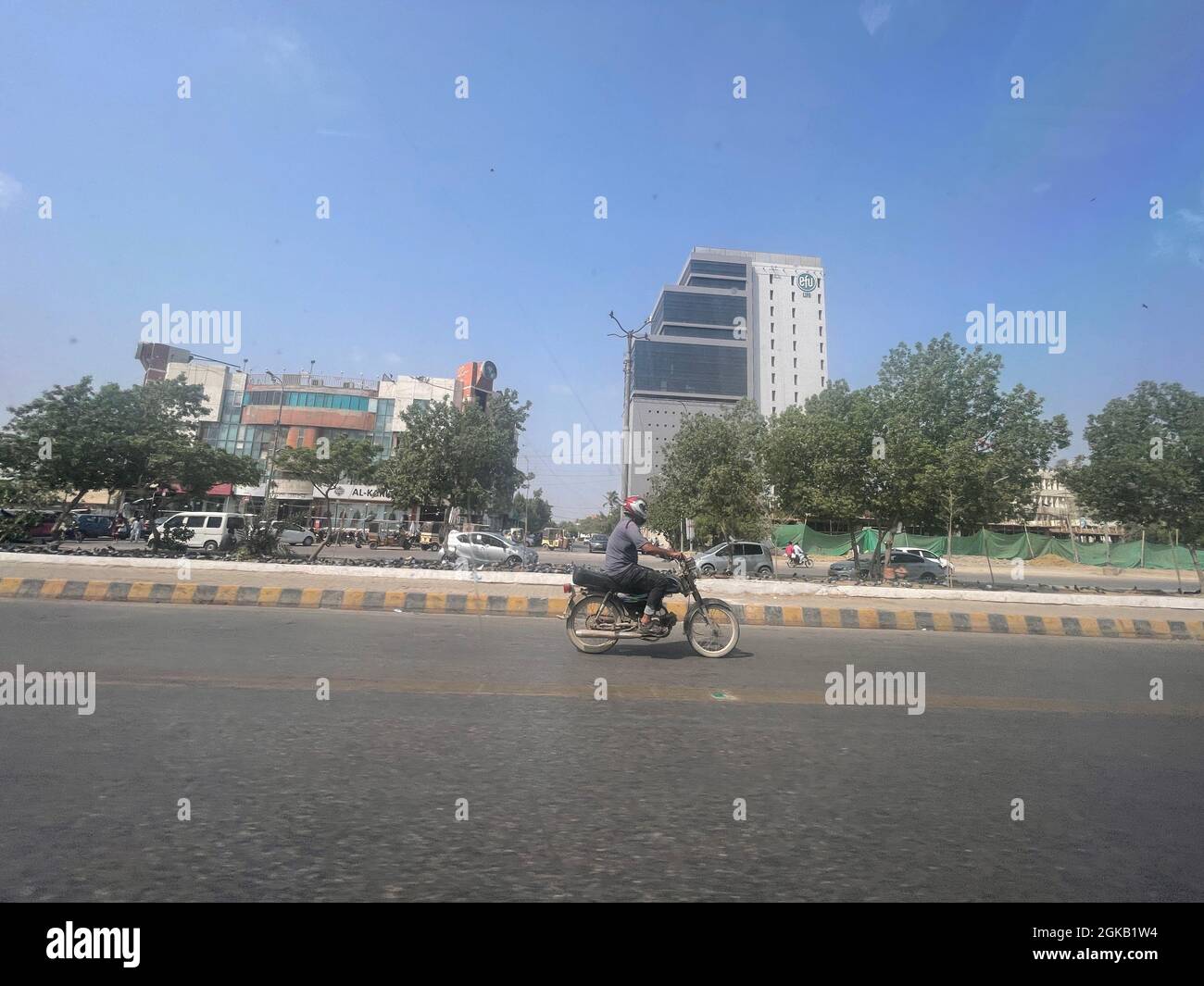 Main Landhi Korangi Road. Karachi city traffic at working hours ...