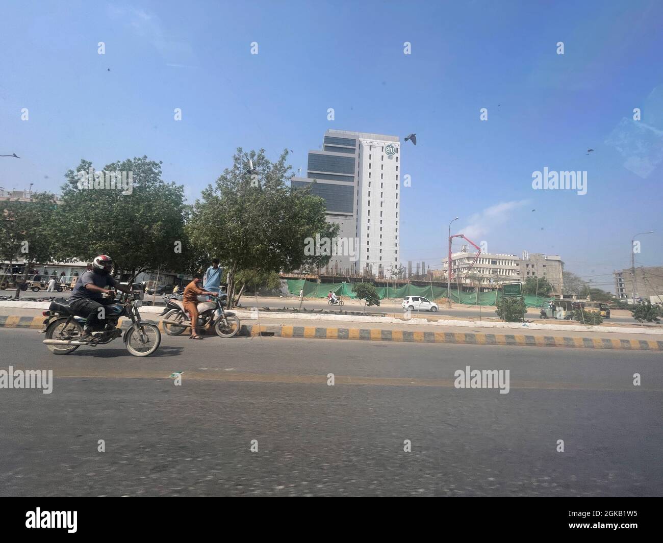 Main Landhi Korangi Road. Karachi city traffic at working hours ...