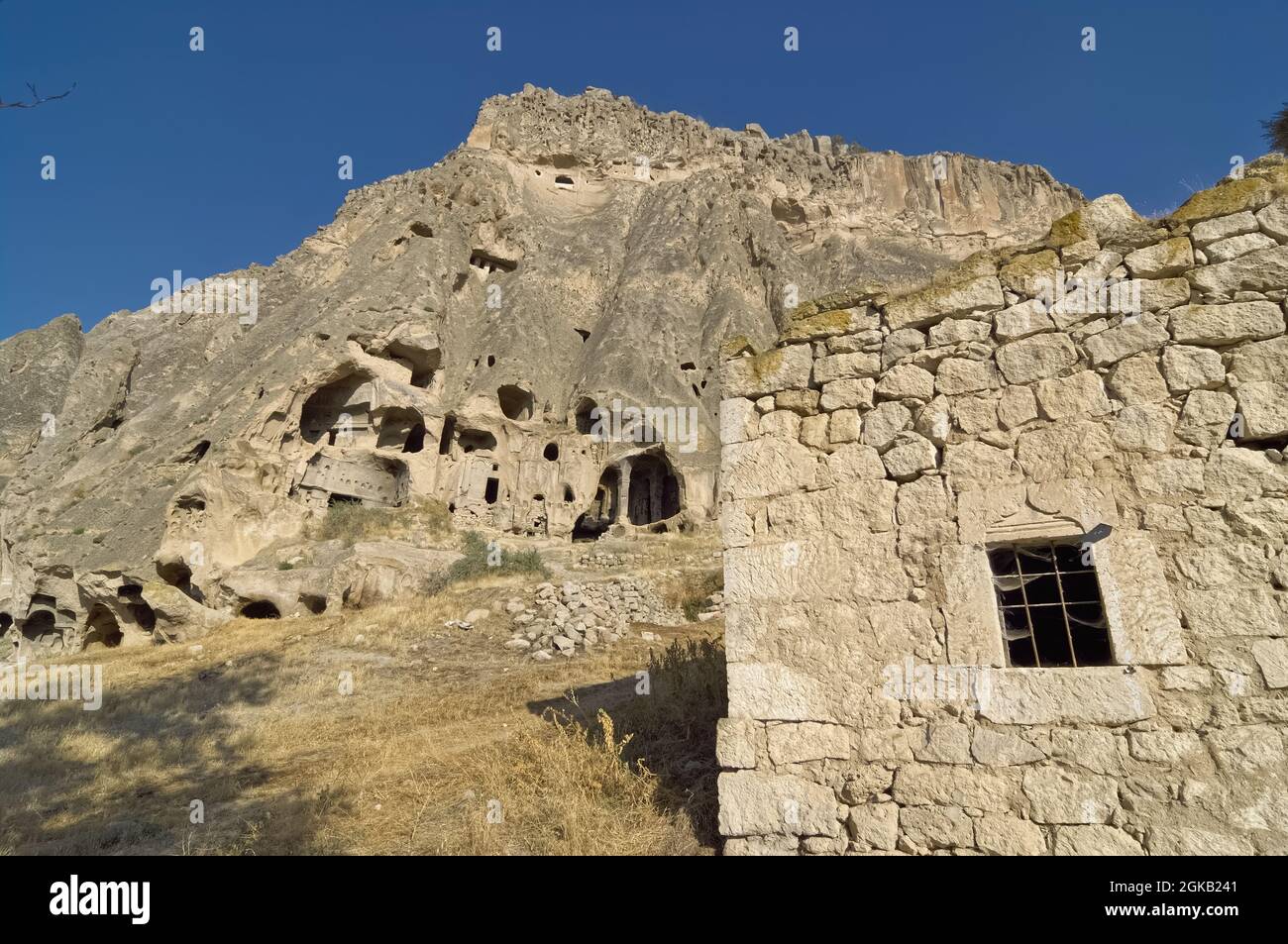 cliff dwelling in Turkey rock cut cave houses of Yaprakhisar in central ...