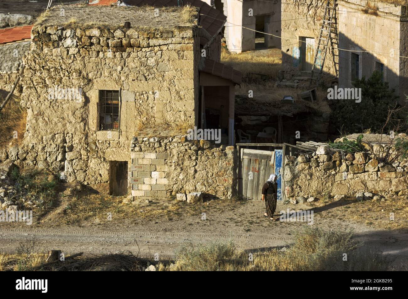 rural scene in Turkey of daily life old woman and abandoned house in ...
