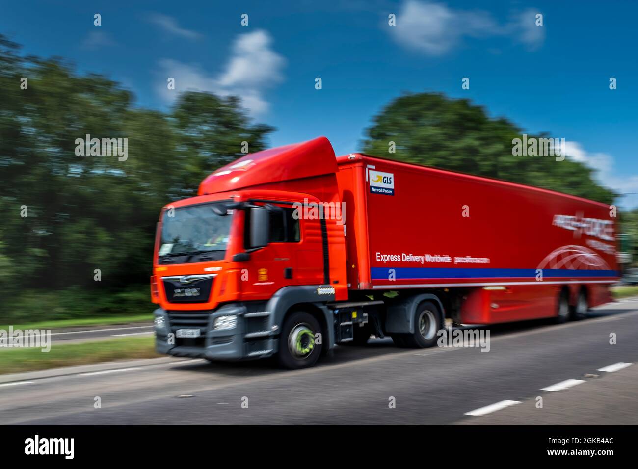 A Parcel Force lorry at speed on a dual carriageway Stock Photo - Alamy