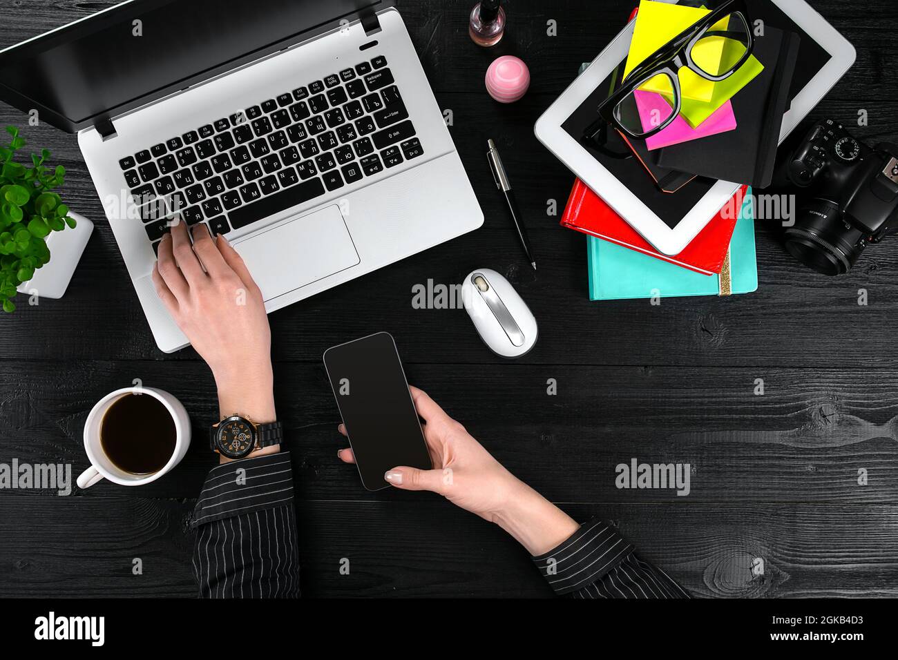 Overhead view of businesswoman working at computer in office Stock ...