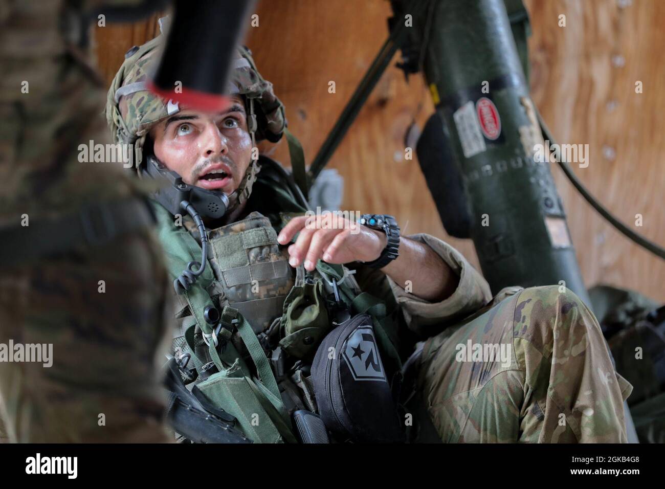 A Soldier with the 45th Infantry Brigade Combat Team, speaks to another ...