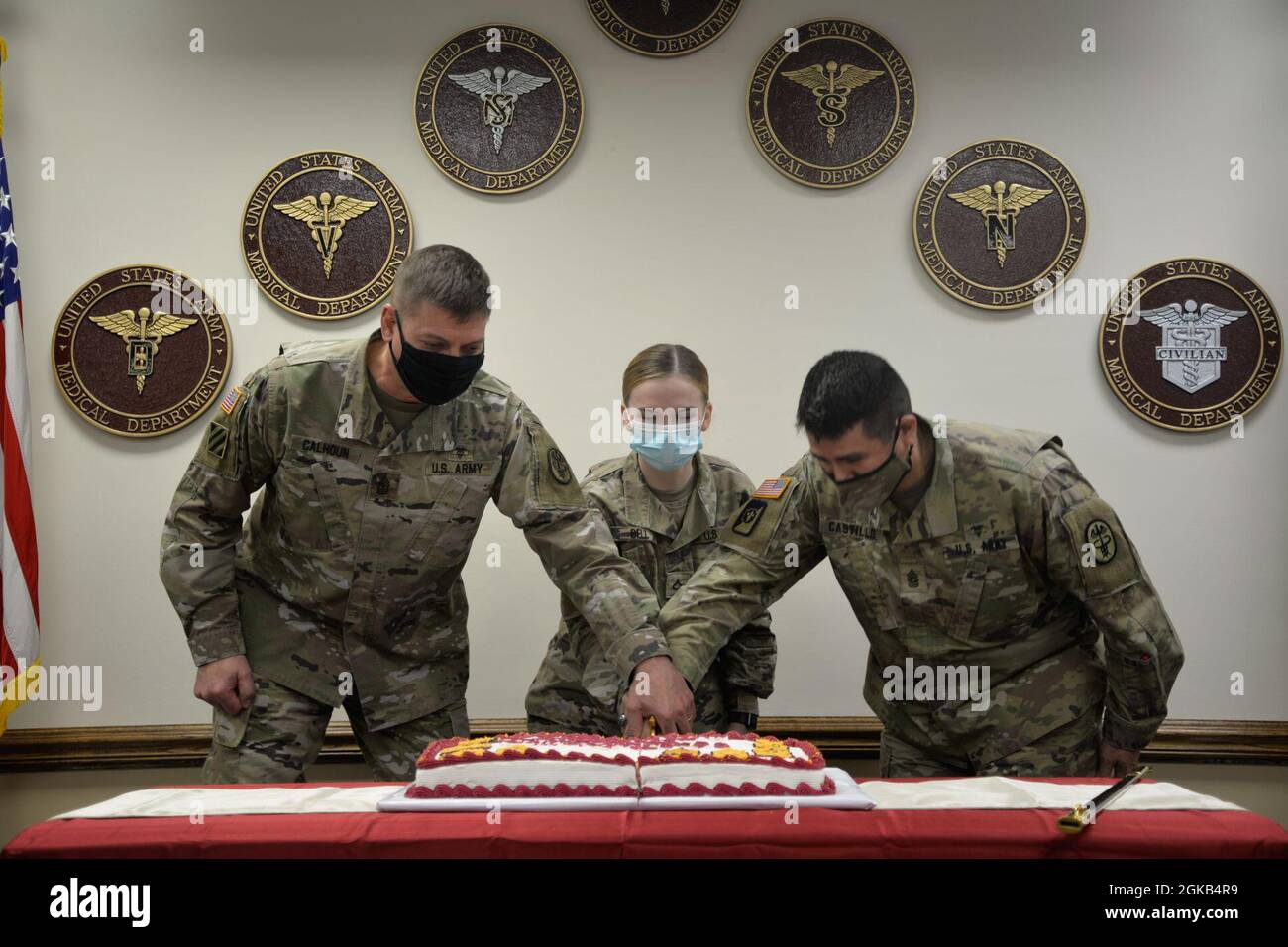 Pictured left to right: 1st Sgt. Jonathan Calhoun, Pfc. Marley Bell ...
