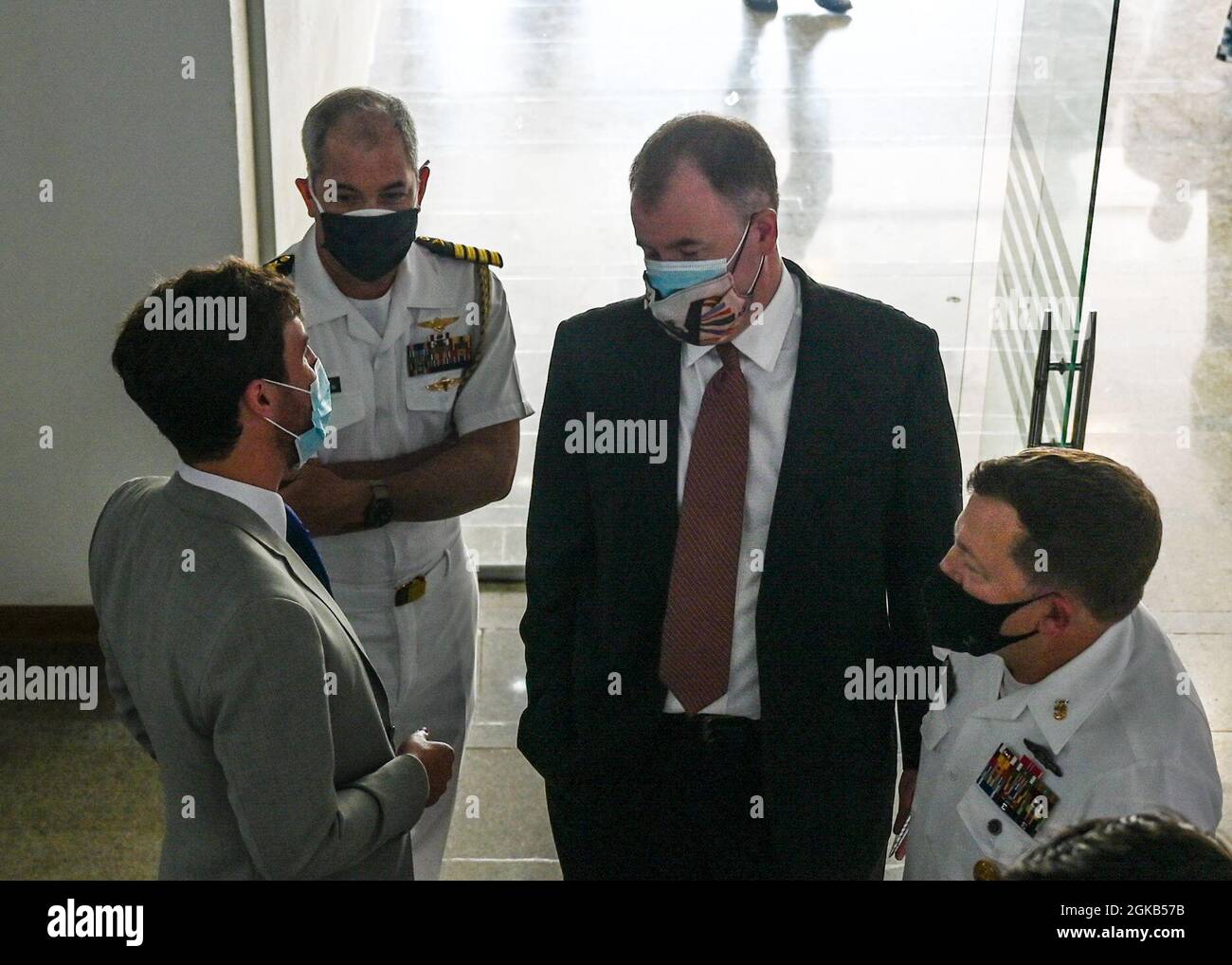 From left, U.S. Embassy Political Officer Bradford Miklavic and Defense ...