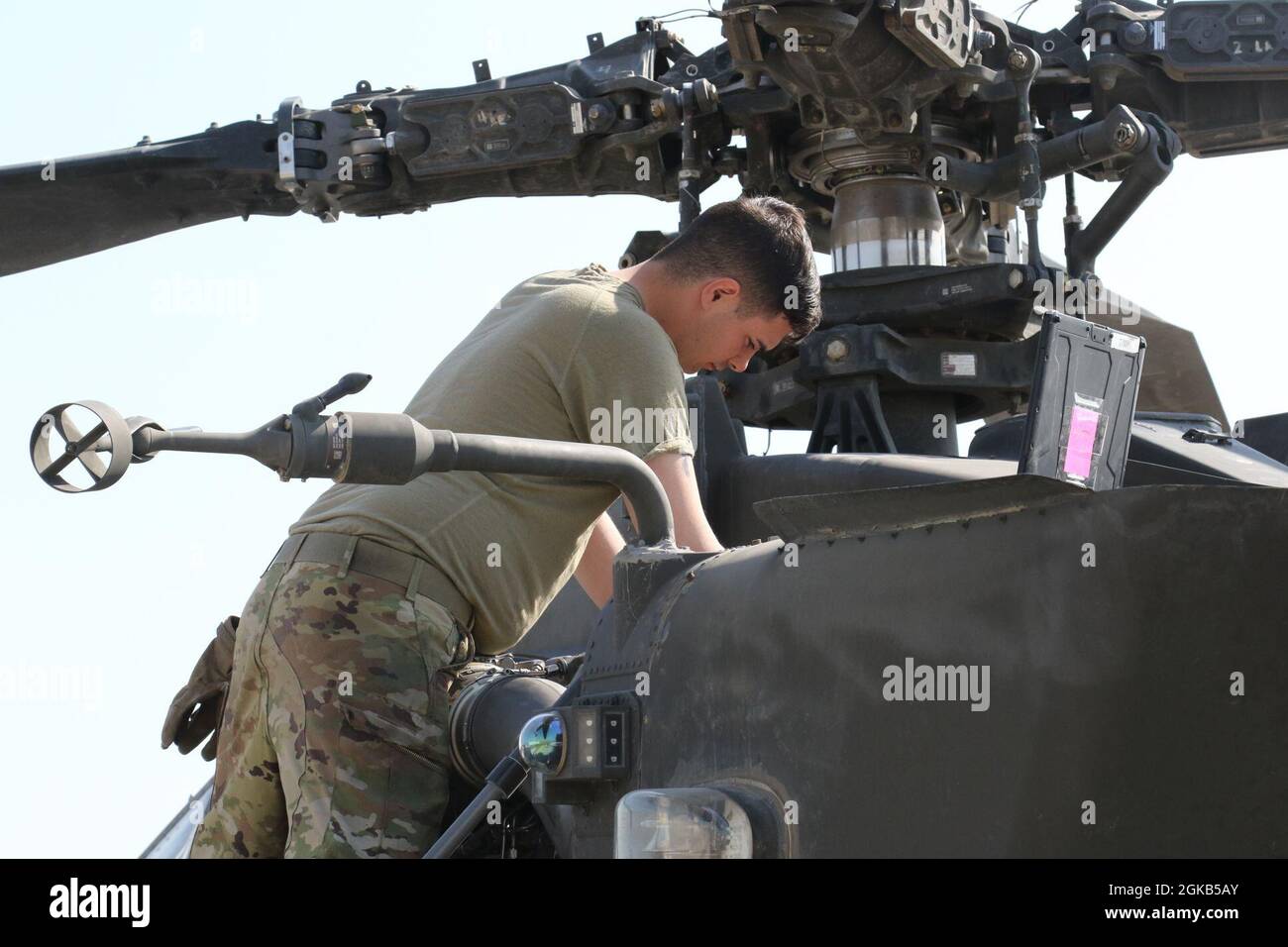 U.S. Army Pfc. Hunter Escue, AH-64 helicopter maintainer with Alpha ...