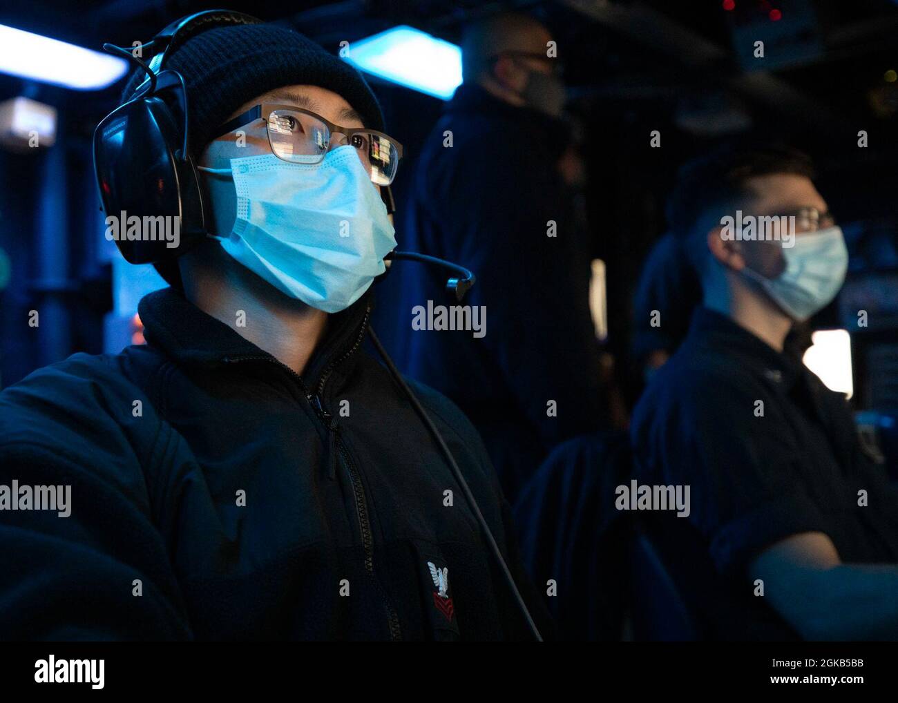 Sonar Technician (Surface) 1st Class Kun Lin stands watch in the sonar ...