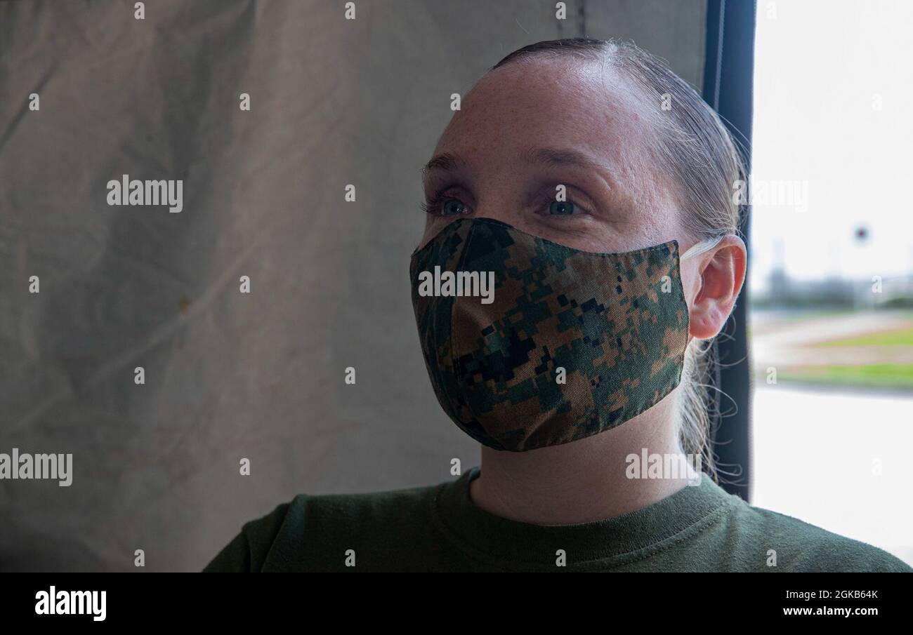 U.S. Marine Corps Staff Sgt. Felicia White, a supply chief with Camp ...