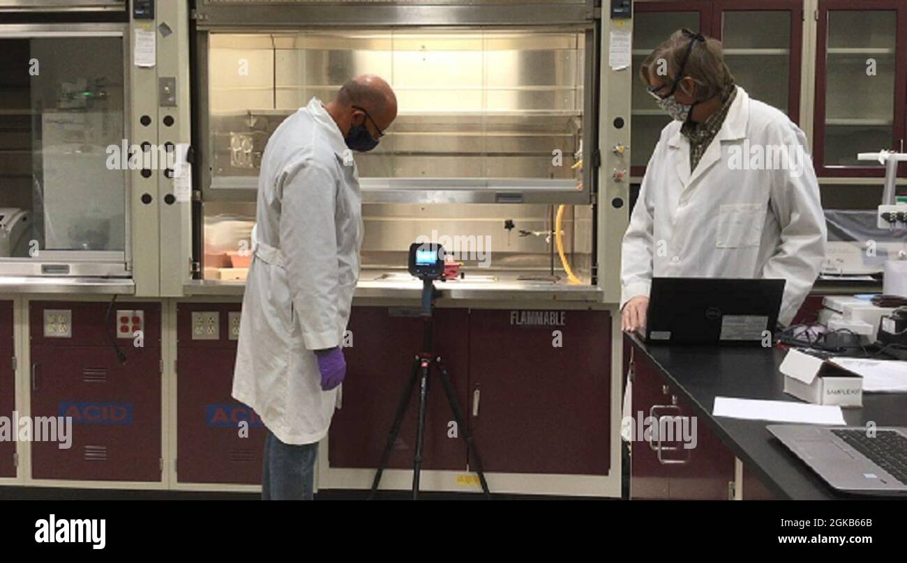 Electrical engineer Dr. Phillip Wilcox and research chemist Dr. Jason ...