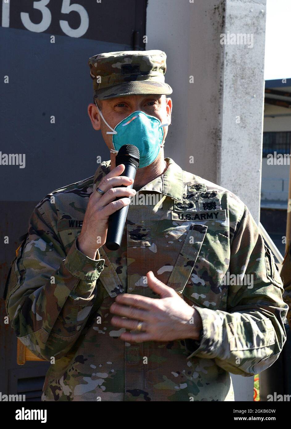 U.S. Army Col. Jason S. Wieman, commander, 30th Medical Brigade, gives ...
