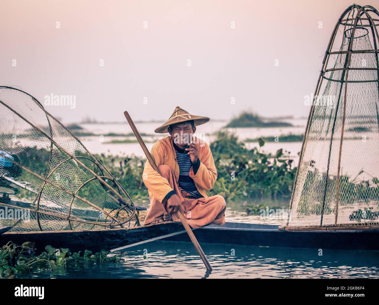Traditional Fisherman Laughing at Sunrise Stock Photo - Alamy