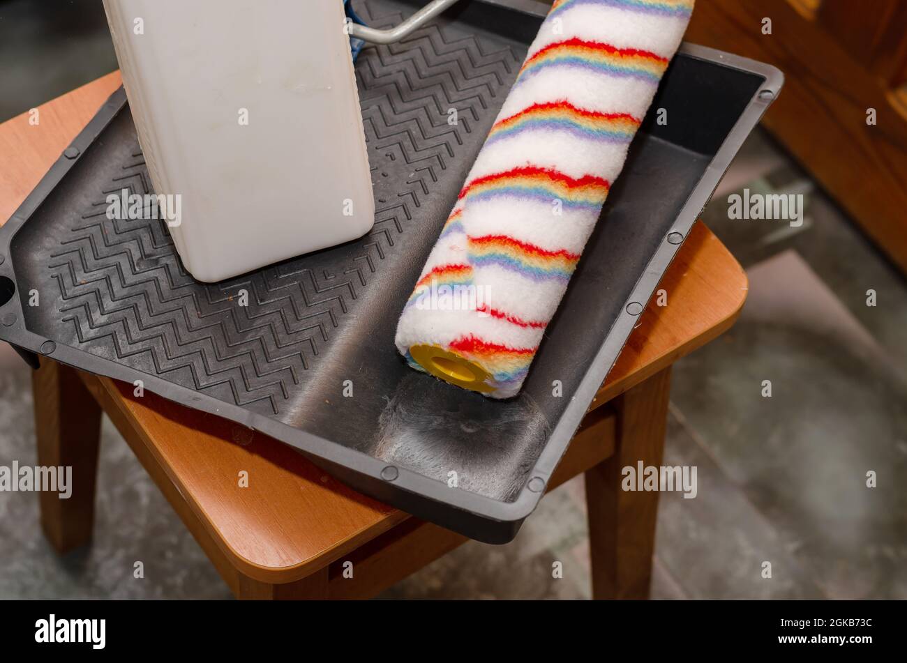 Wall primer, paint tray, Variegated paint roller. Painting tools Stock ...