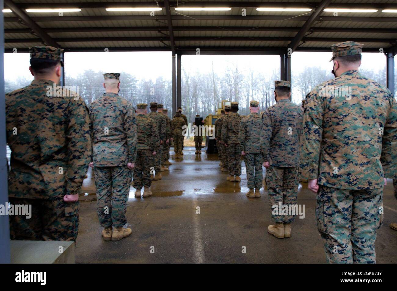 Marines at the Marine Corps Information Operations Center (MCIOC) stand ...
