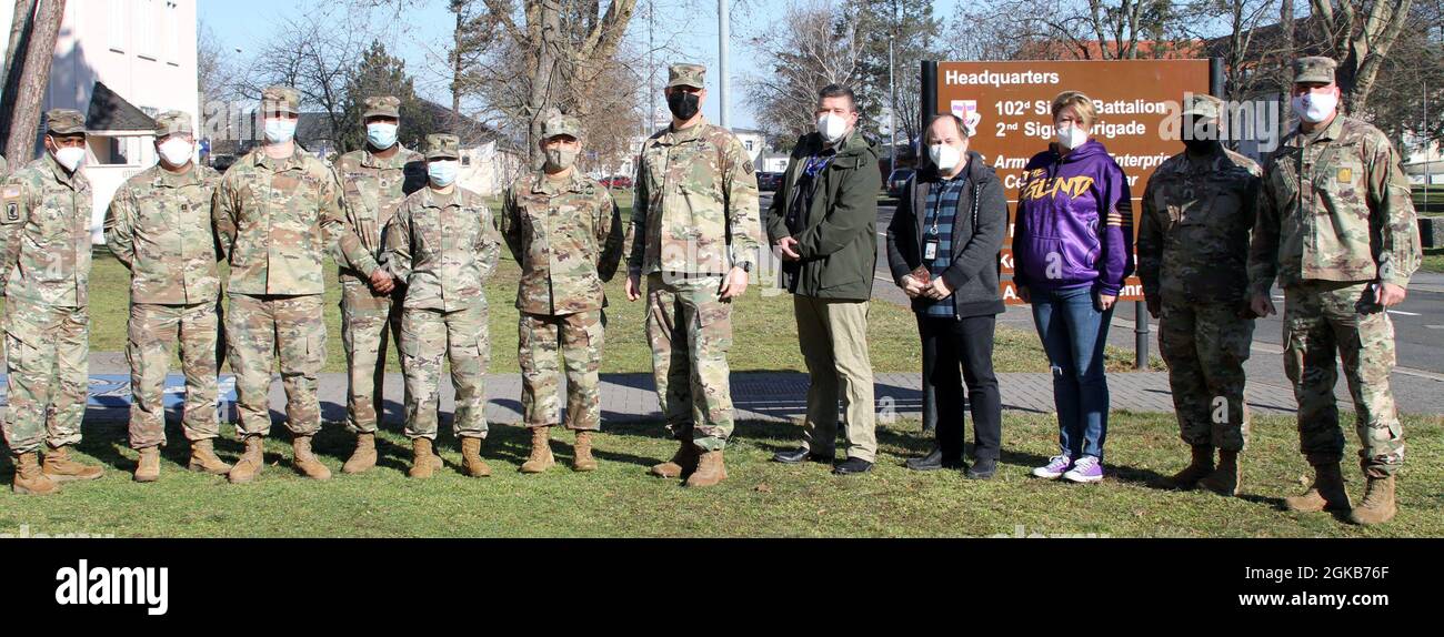 Colonel Michael R. Kaloostian, Commander, 2d Theater Signal Brigade, and Command Sgt. Maj ...
