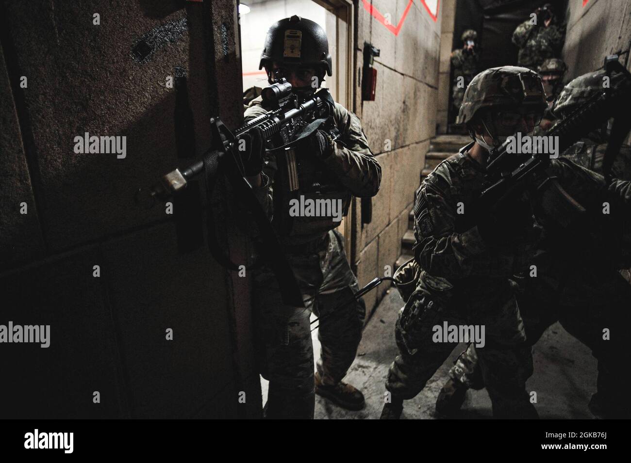 U.S. Soldiers assigned to 55th Signal Company (COMCAM), clear a shoot ...