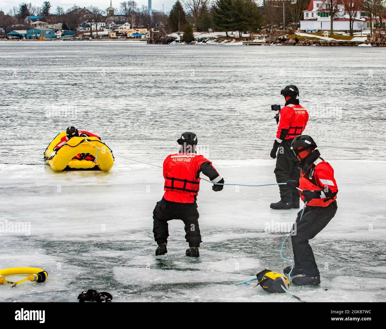 Members of the U.S. Coast Guardsmen pull Command Sgt. Maj. Mario ...