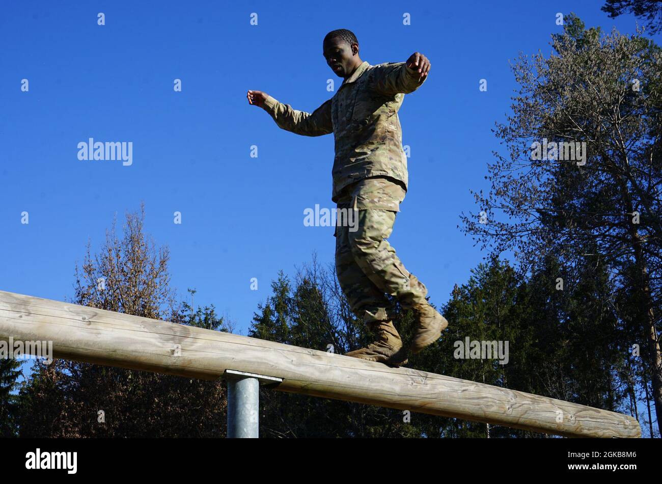 Staff Sgt. Cornel Varnado, USAG Bavaria, walks the balance beam ...