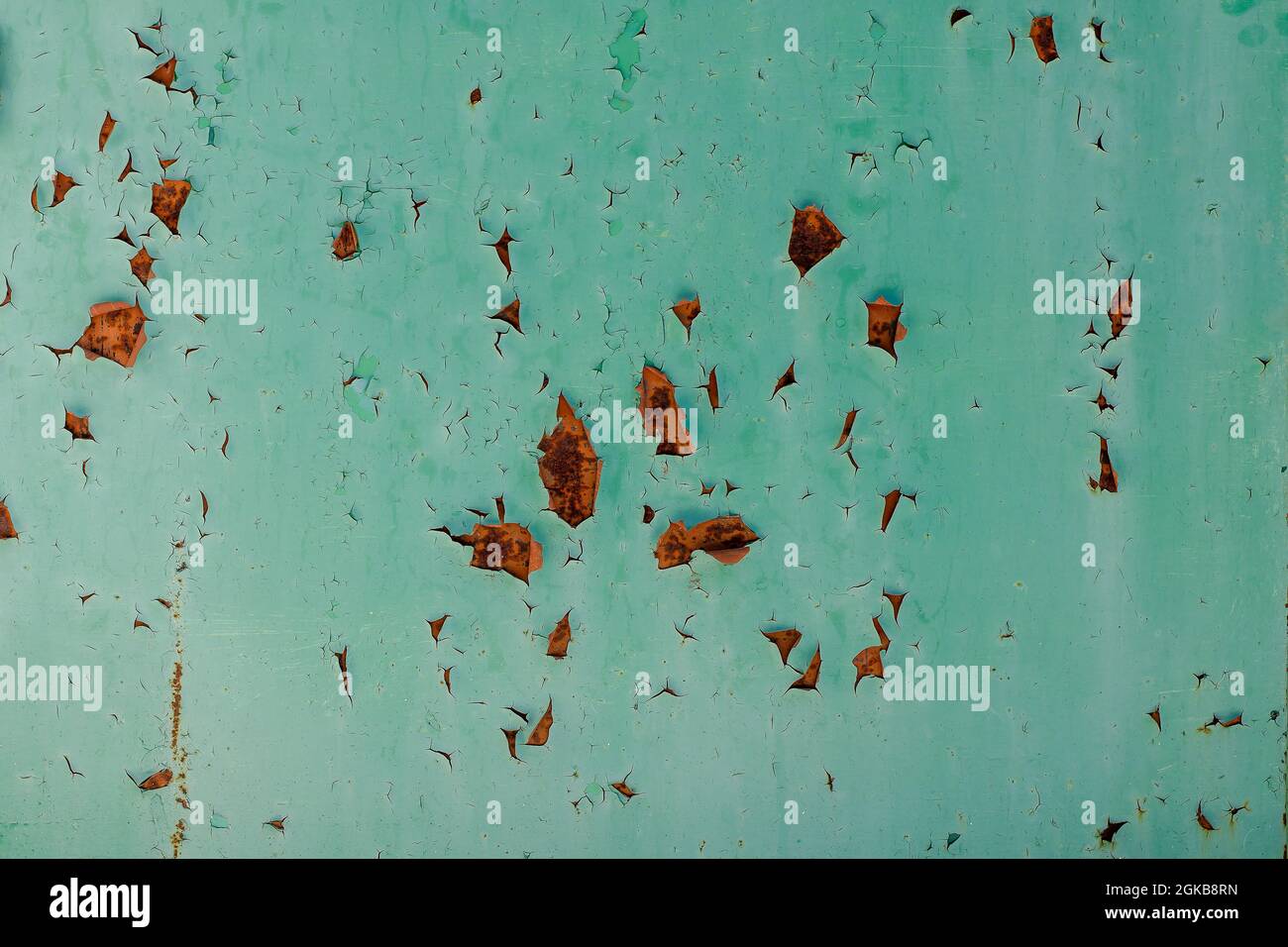 Rusty metal surface painted green. The paint is cracked. Abstrac Stock ...