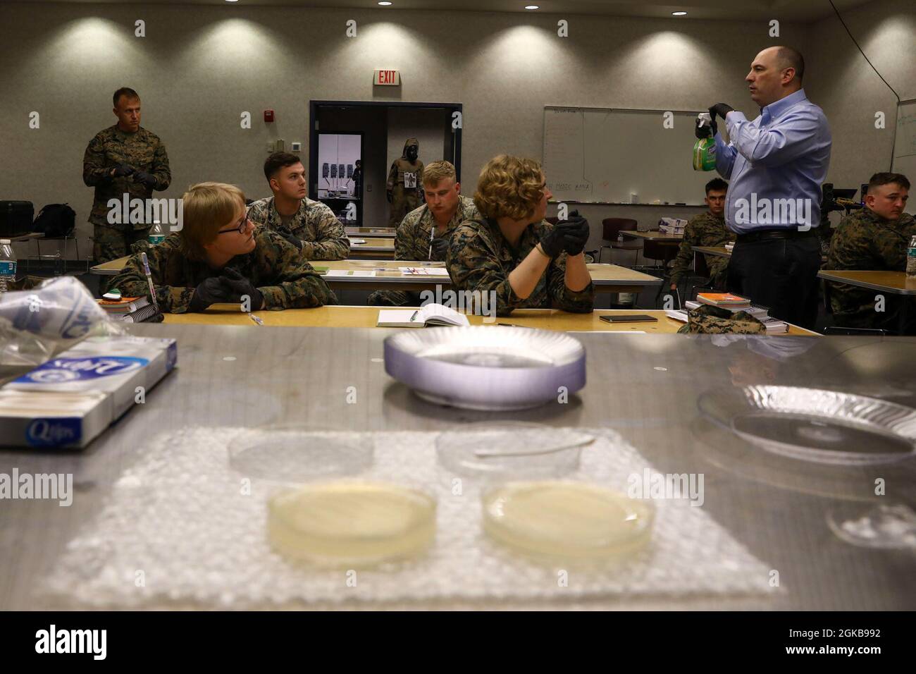 Gary Sharp, an instructor with Guardian Centers, conducts a lab for ...