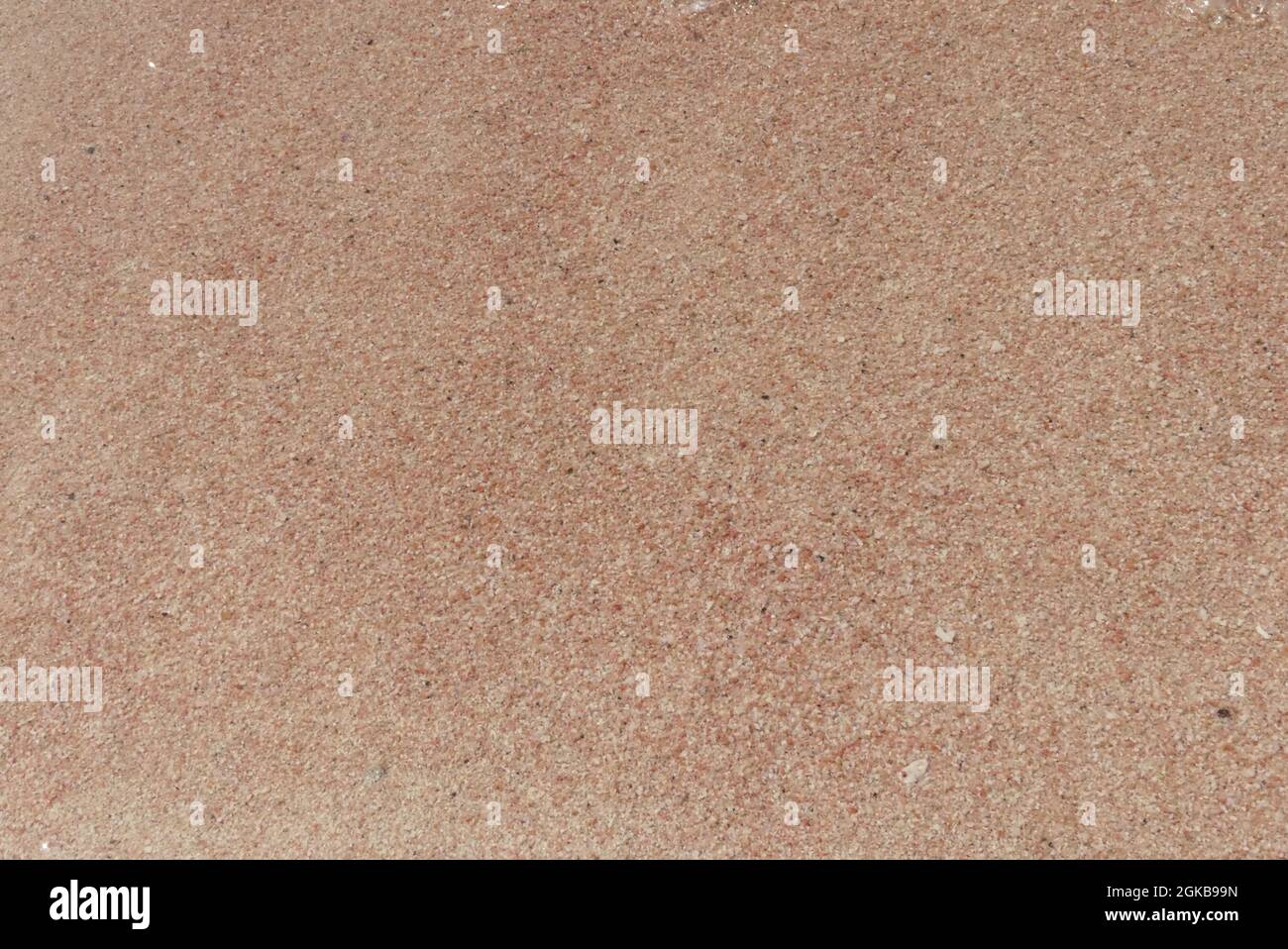 Pink sand through transparent Stock Photo - Alamy