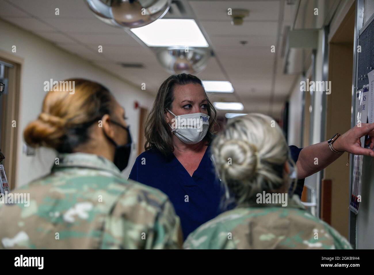 Beth Garrison, organization development professional, shows the Airmen ...