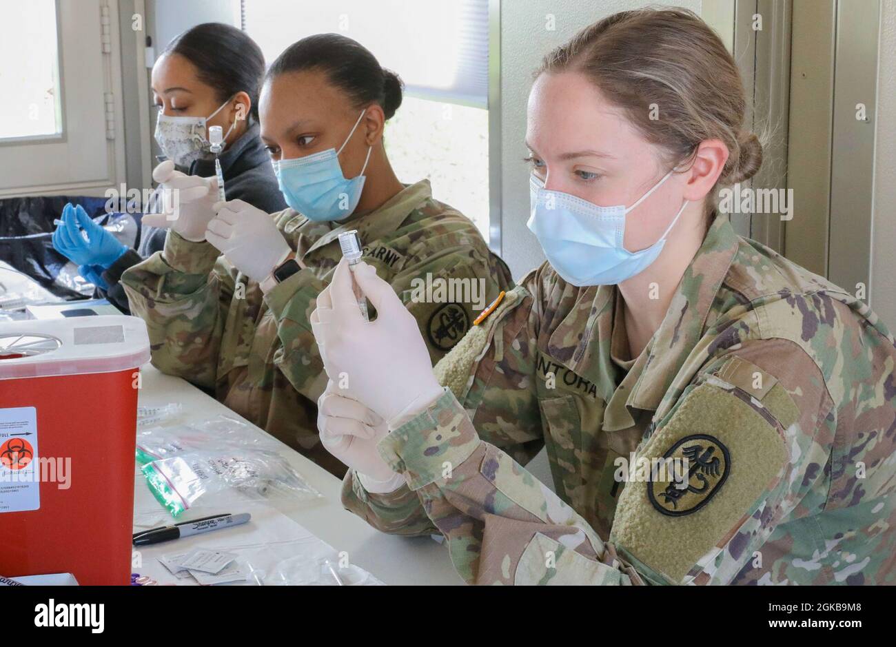 U.S. Army 1st Lt. Abigail Santora, right , a medical surgical nurse at ...