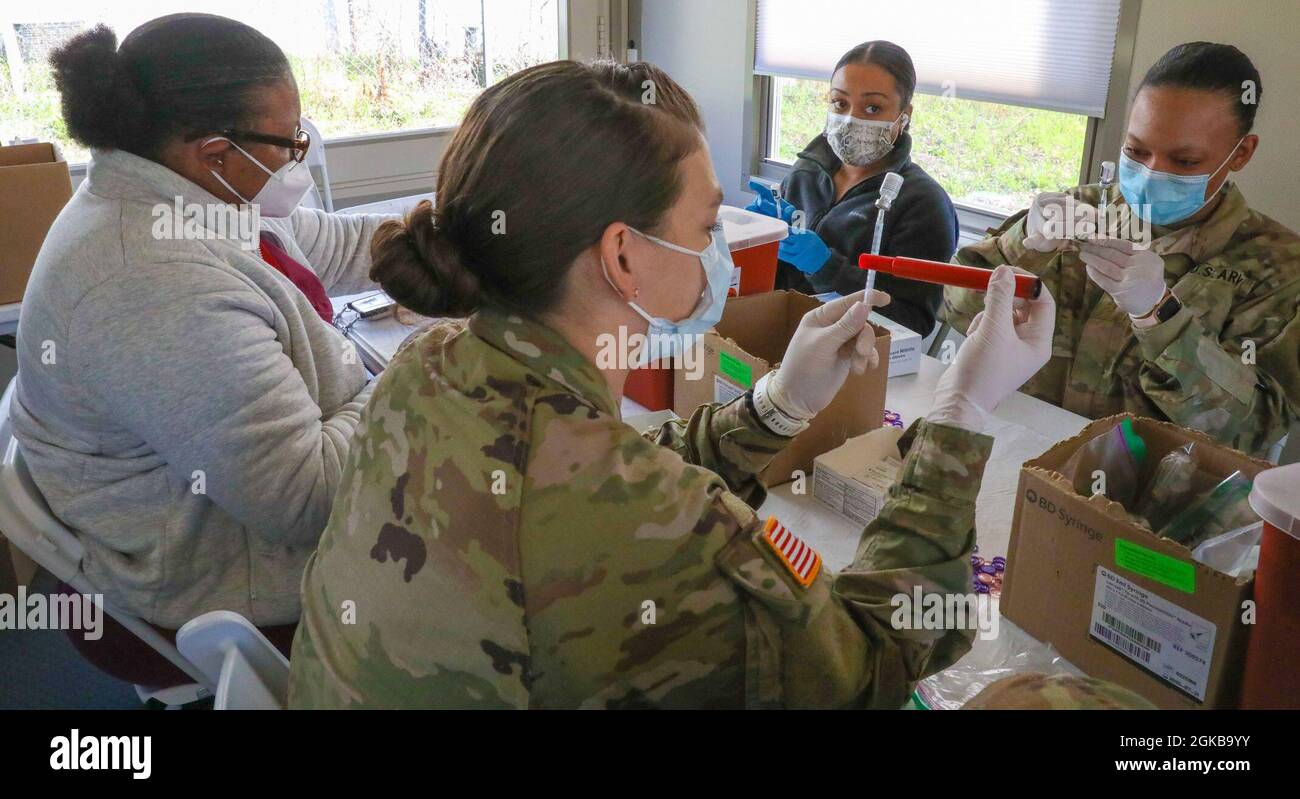 U.S. Army 2nd Lt. Maria Frisone, front right, a medical surgical nurse ...