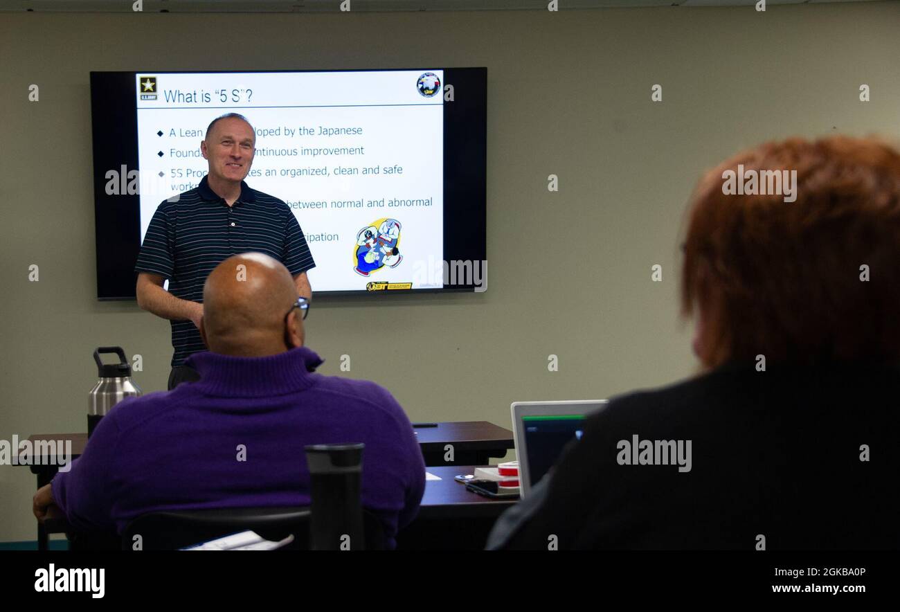 Garrison Deputy Commander Lt. Col. Alexander Carter teaches a Lean Six ...