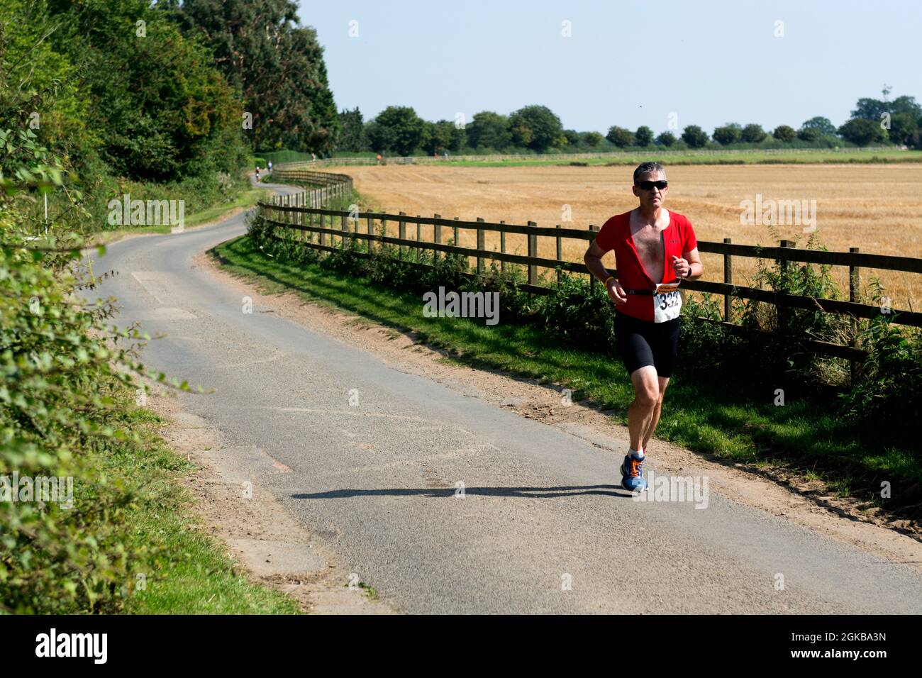 A runner in the Battle of Bosworth Triathlon, Shenton, Leicestershire ...