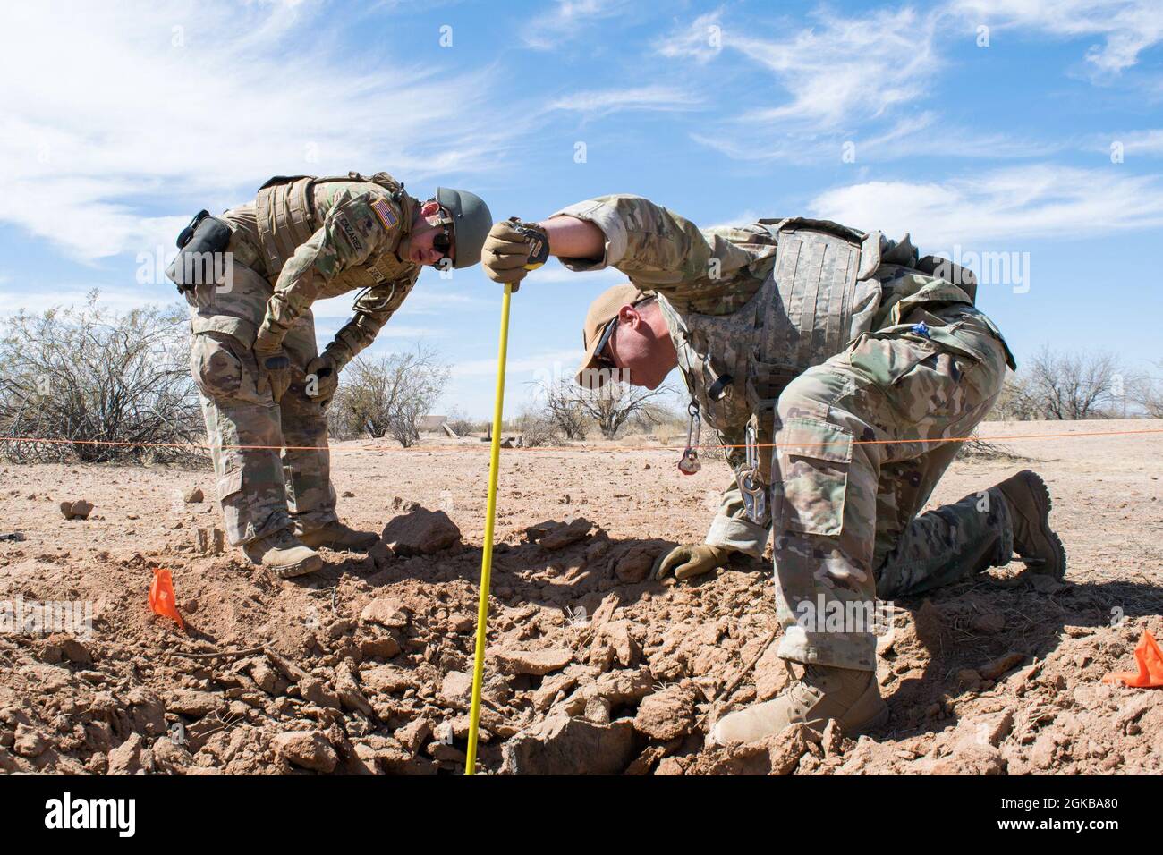 Two Army Explosive Ordnance Disposal Technicians with 363rd EOD Company, Arizona National Guard ...