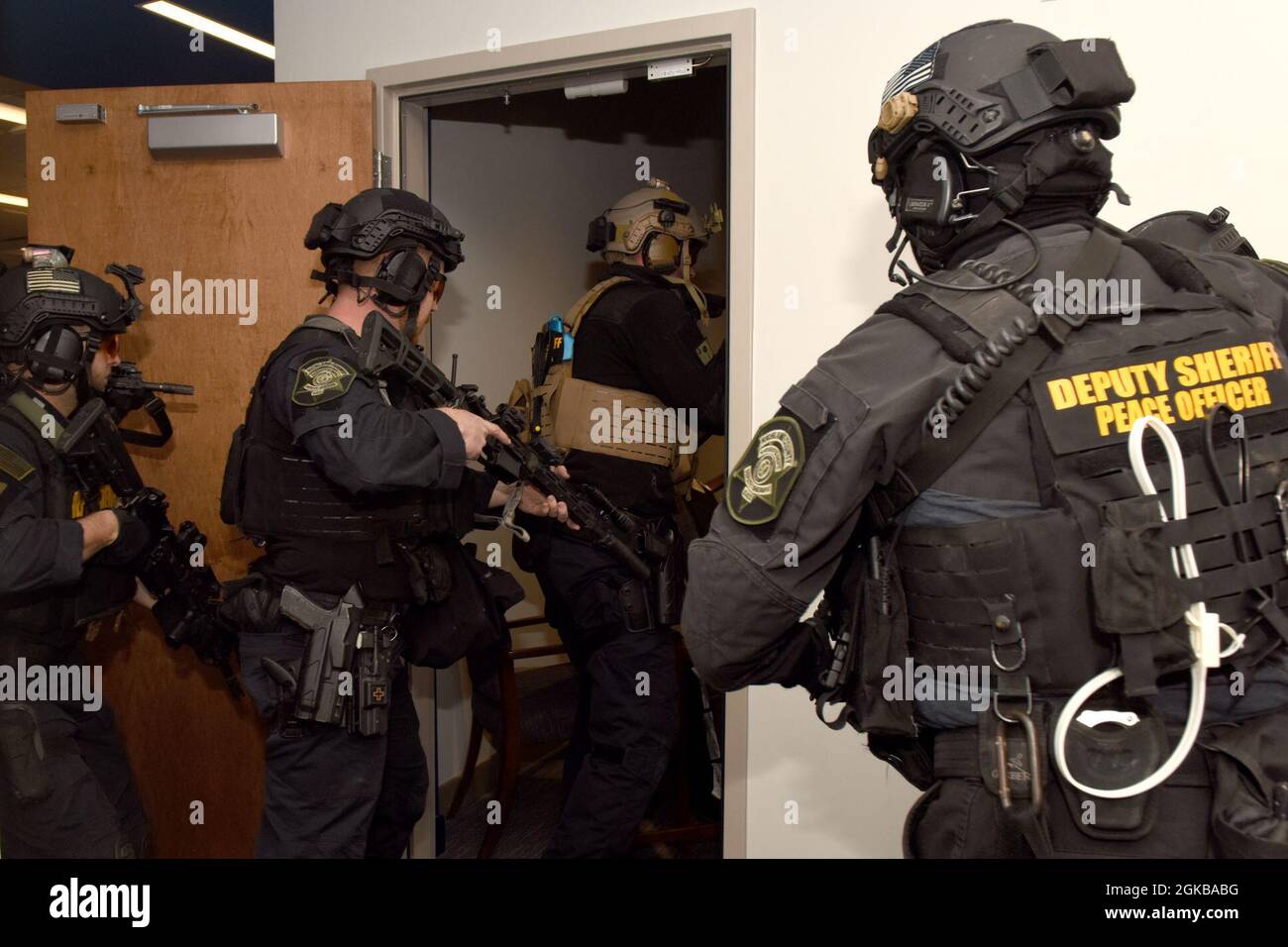 169th Fighter Wing Security Forces defenders team up with local law enforcement officers from ...