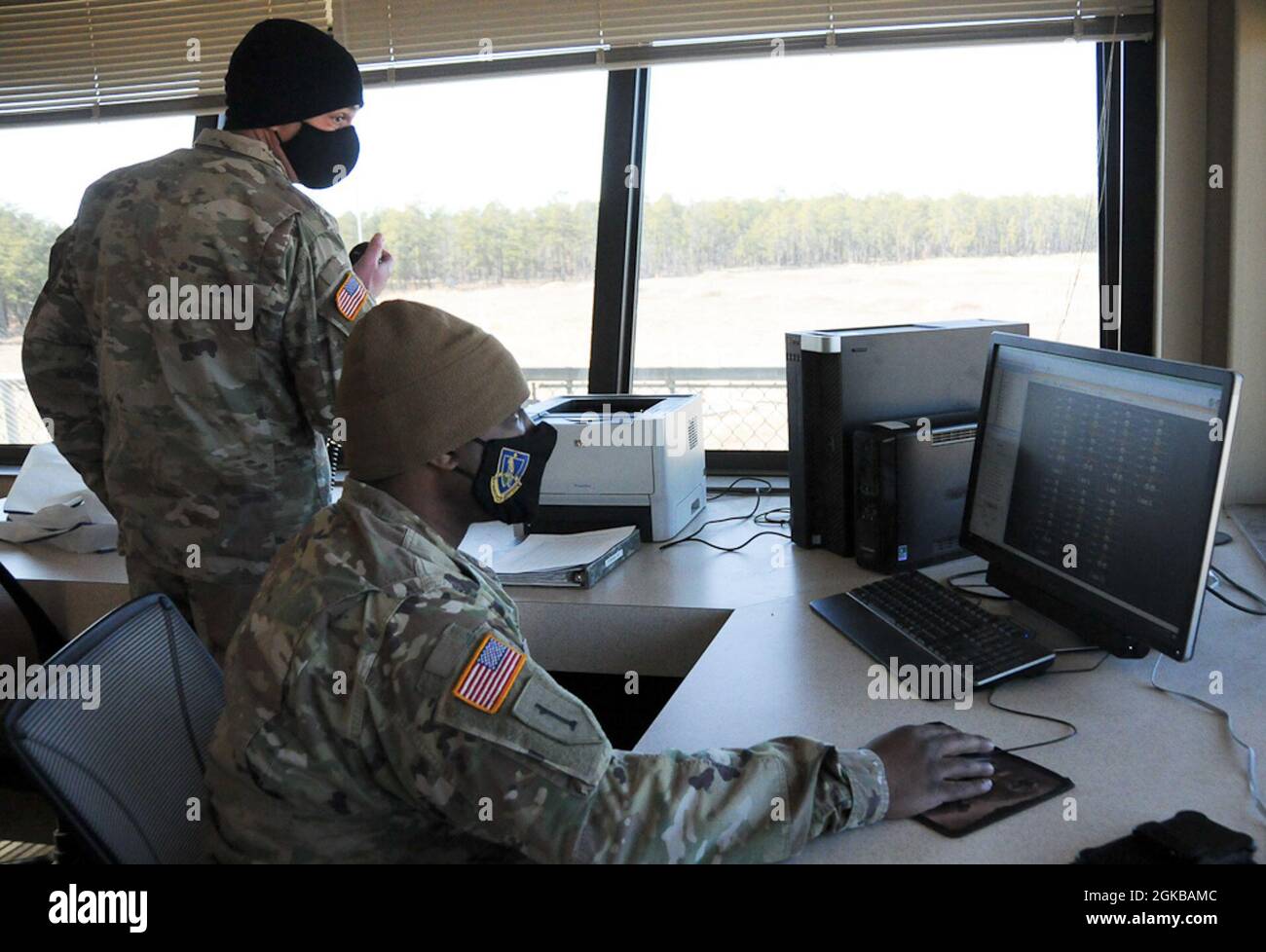Sgt. 1st Class Jonathan Jaynes (left) and Staff Sgt. Fredrick Bailey of ...