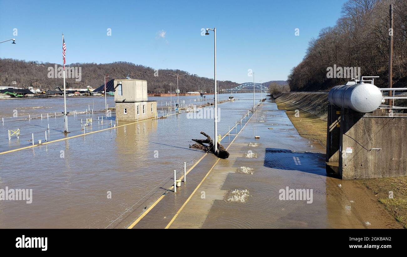 Even after flood waters have receded, large debris, such as tree ...