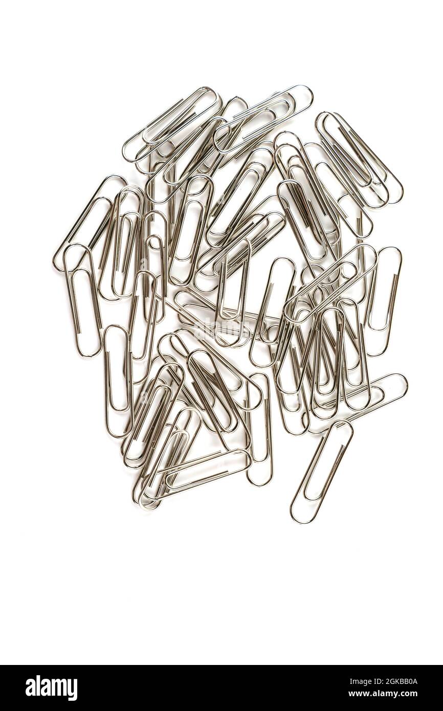 steel paper clip on white background Stock Photo - Alamy