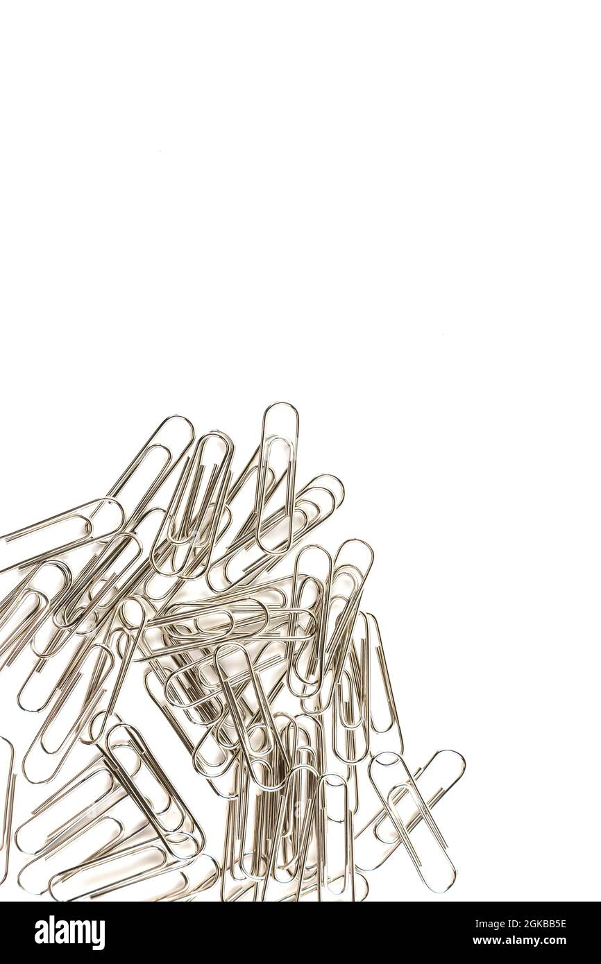 steel paper clip on white background Stock Photo - Alamy