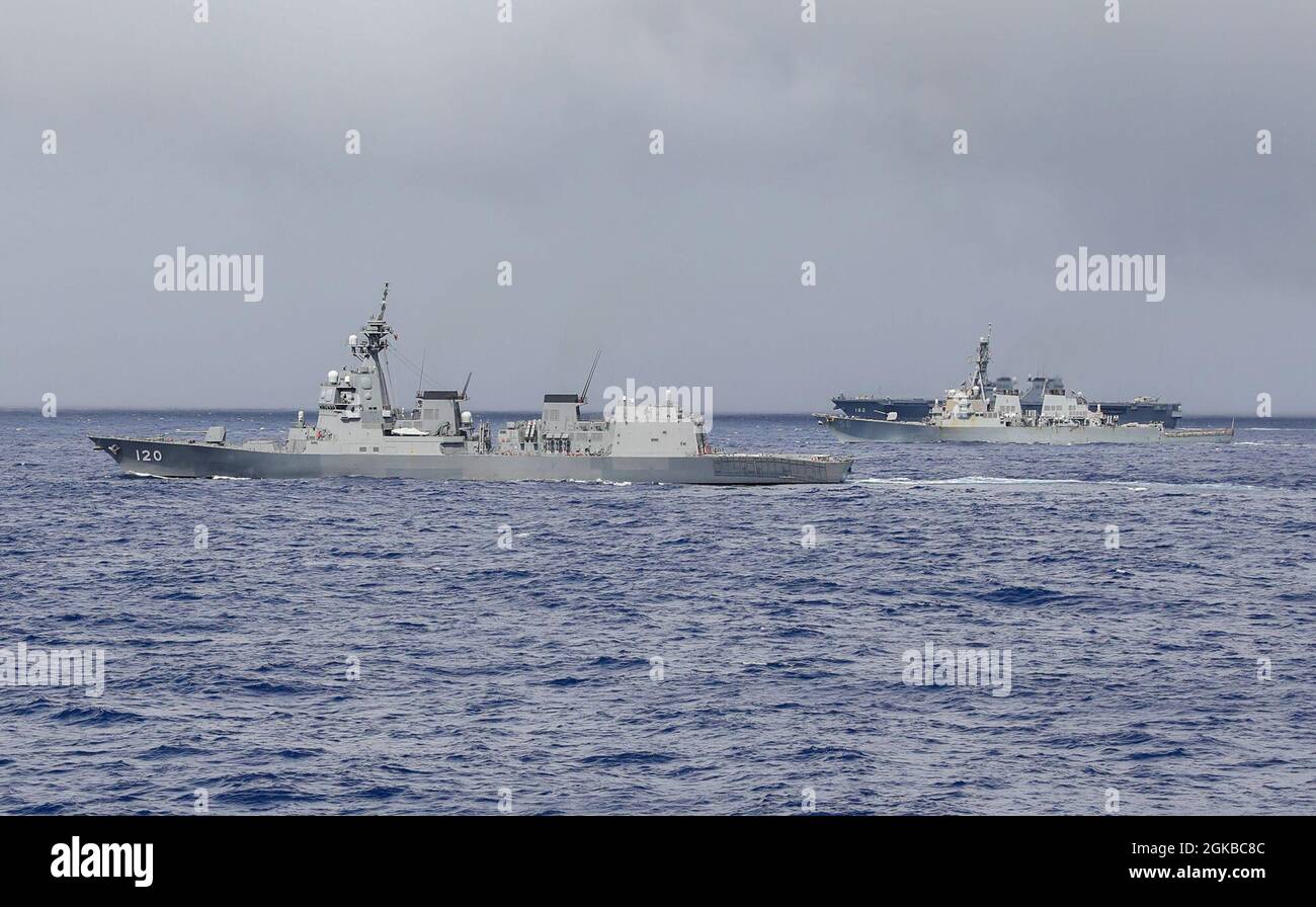The Arleigh Burke-class guided-missile destroyer USS John S. McCain ...